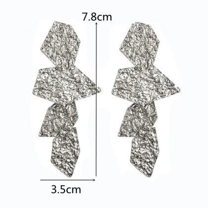 Elegant Gold And Silver Knot Stud Earrings on Luulla