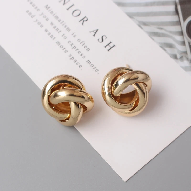 Elegant Gold And Silver Knot Stud Earrings on Luulla
