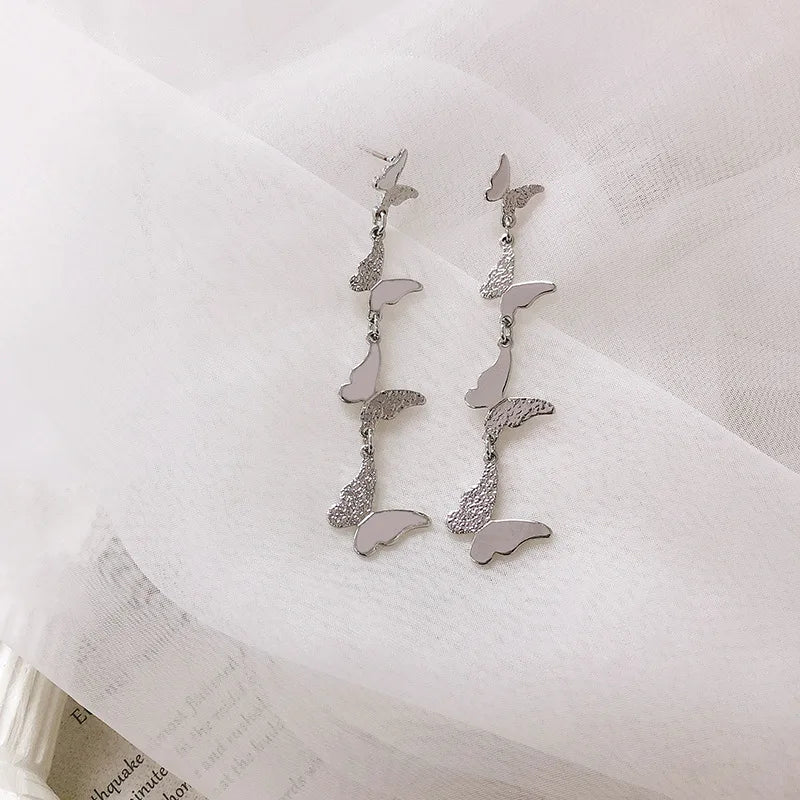 Elegant Gold And Silver Knot Stud Earrings on Luulla