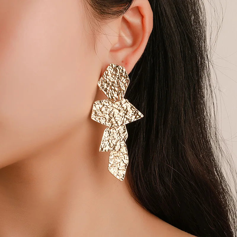 Elegant Gold And Silver Knot Stud Earrings on Luulla