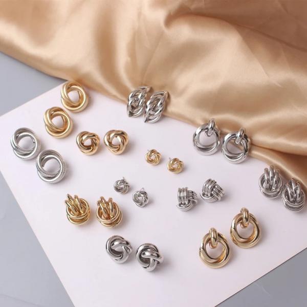 Elegant Gold And Silver Knot Stud Earrings on Luulla