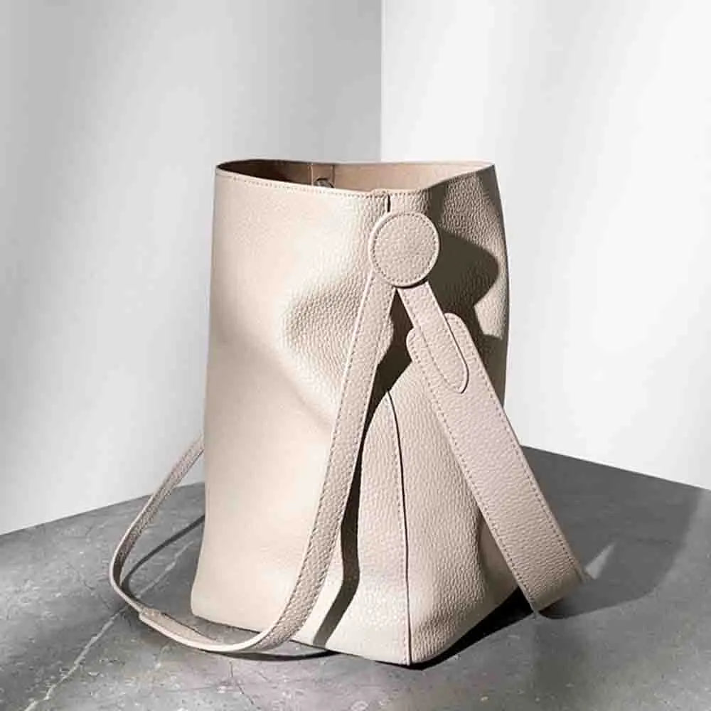 Elegant Tan Leather Bucket Bag With Modern Closure on Luulla