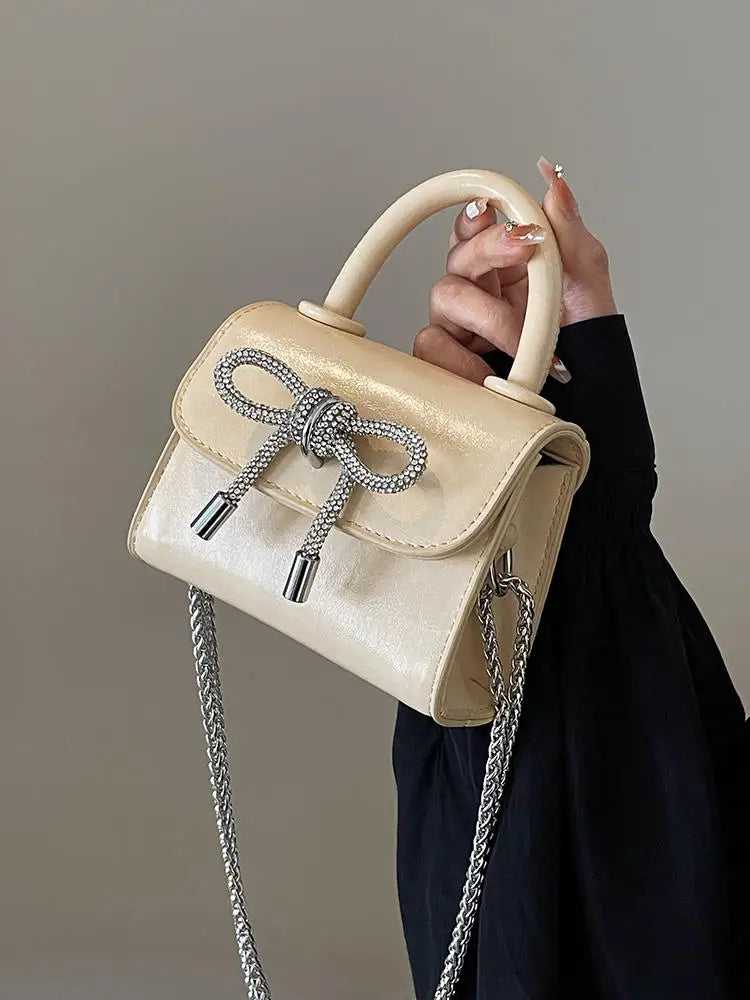Chic Beige Handbag With Elegant Knot Design on Luulla