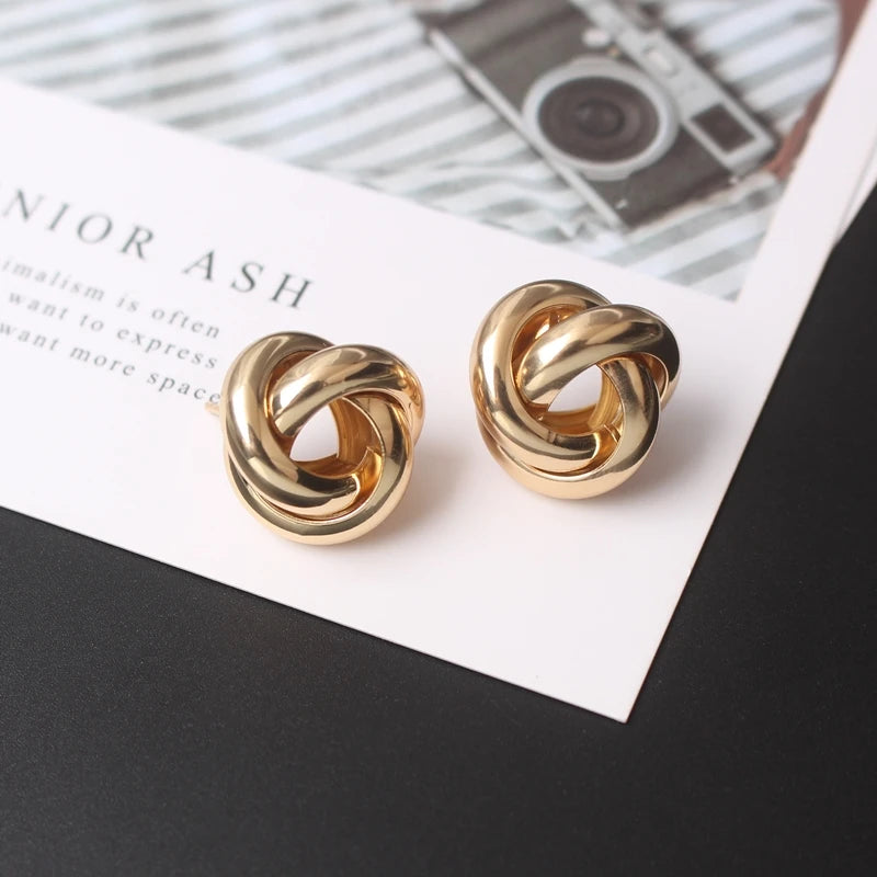 Elegant Gold And Silver Knot Stud Earrings on Luulla