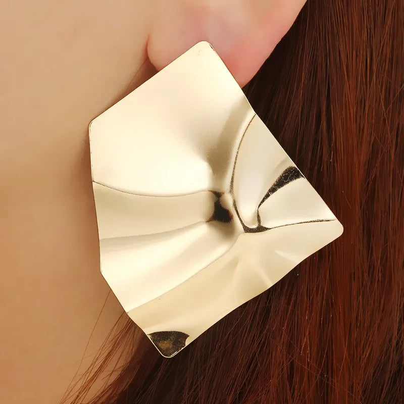 Elegant Gold And Silver Knot Stud Earrings on Luulla