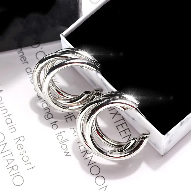 Elegant Gold And Silver Knot Stud Earrings on Luulla