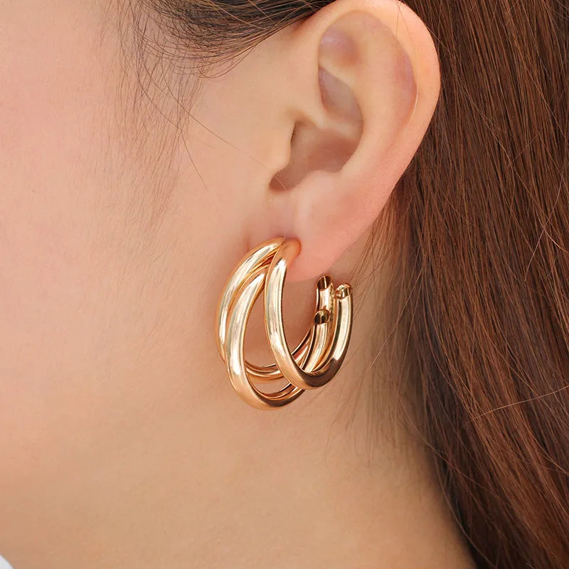 Elegant Gold And Silver Knot Stud Earrings on Luulla