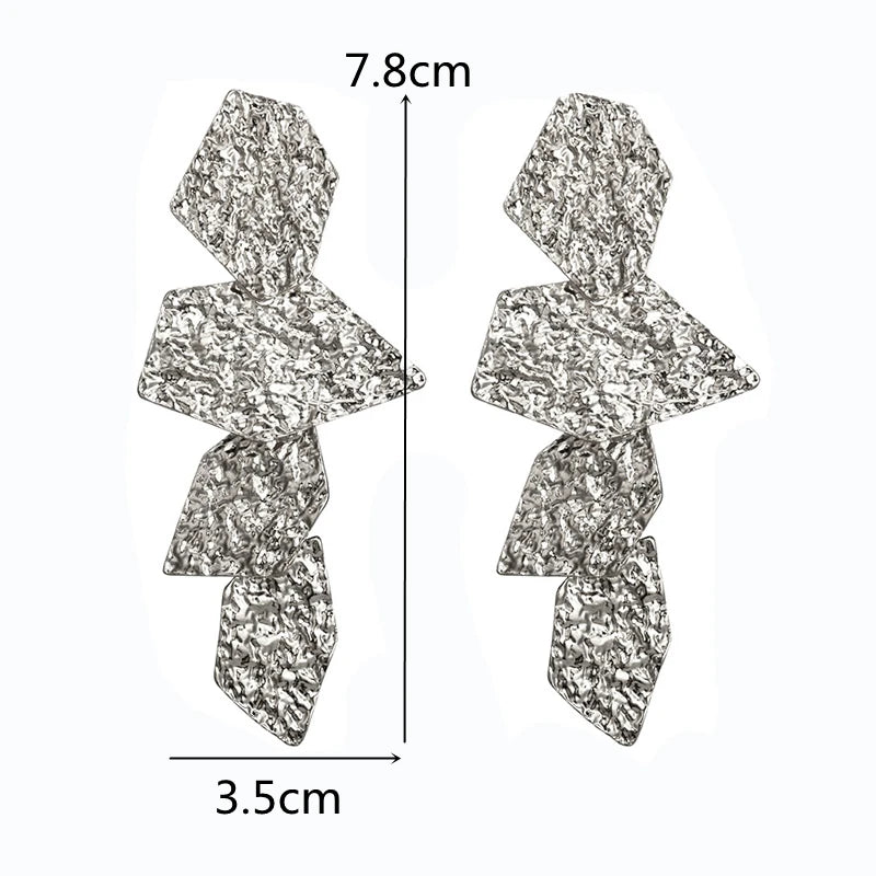 Elegant Gold And Silver Knot Stud Earrings on Luulla